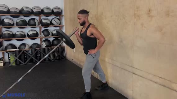 MuscleWiki - Landmine Single Arm Staggered Overhead Press - Shoulders