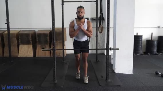 MuscleWiki - Bodyweight Staggered Waiters Bow - Glutes