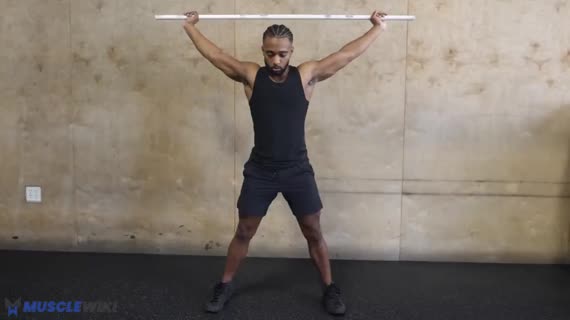 MuscleWiki - Pole Overhead Squat - Glutes