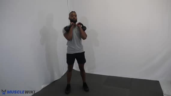 MuscleWiki - Kettlebell Front Rack Curtsy Lunge (Double) - Glutes