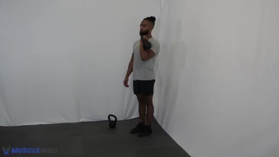 MuscleWiki - Kettlebell Single Arm Front Rack Forward Lunge - Glutes