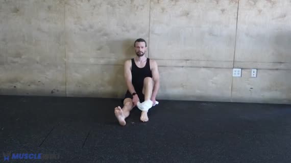 MuscleWiki - Seated Quad Stretch - Quads
