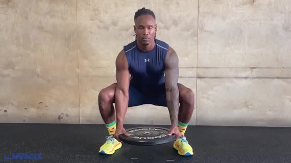 MuscleWiki - Plate Squat Hold Curl - Biceps